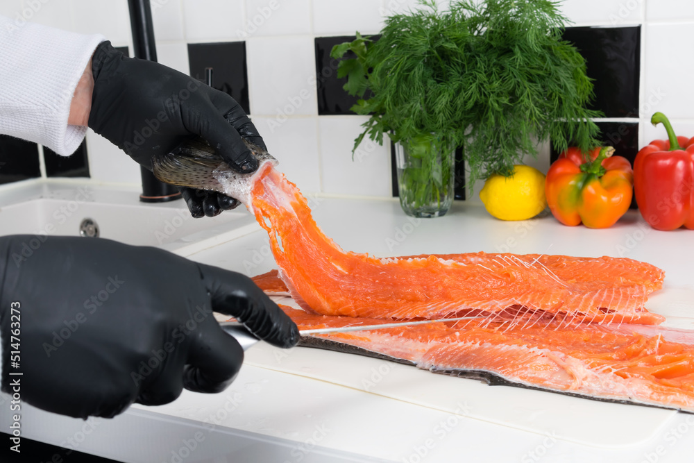 the process of separating the bone from the pulp of red trout, by a ...