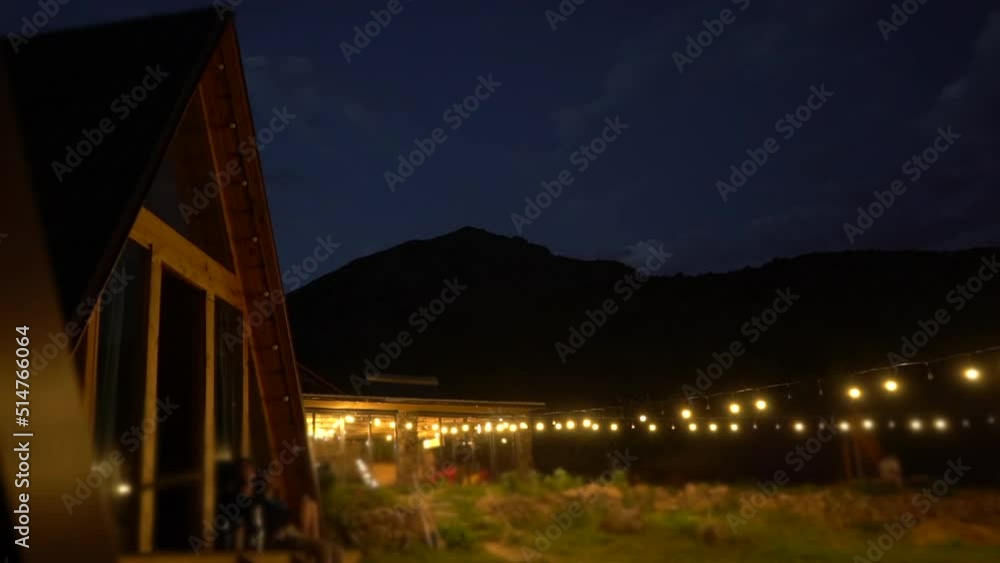 timelapse night sky in glamping. Modern hotel in the mountain resort ...
