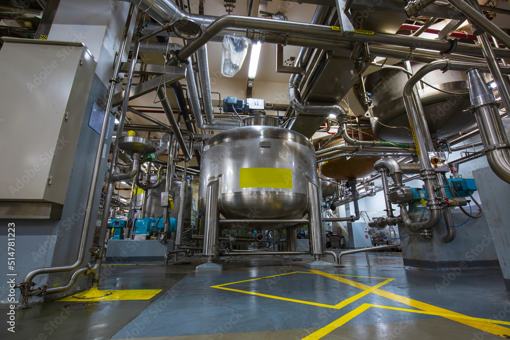 Stainless vertical steel tanks with equipment tank chemical cellar at ...