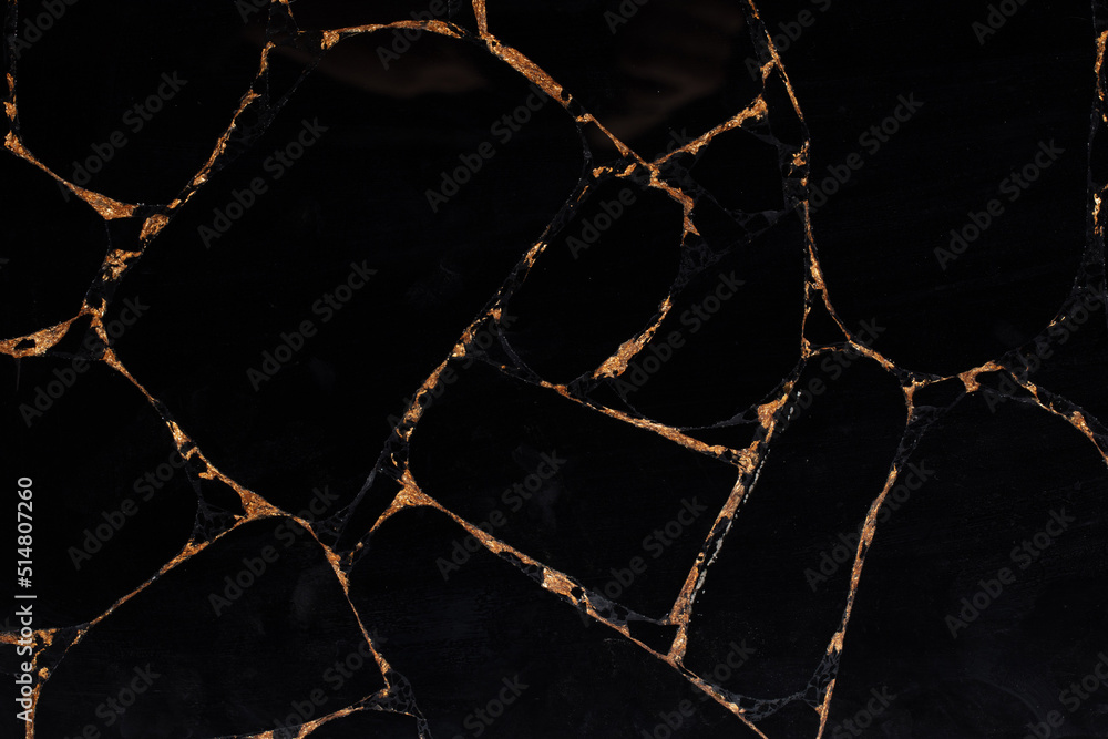 Black Obsidian stone texture with a gold leaf, semi precious background ...