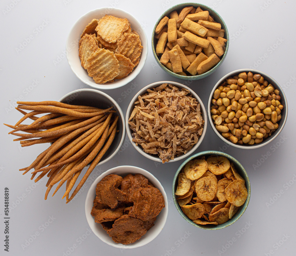 A selection on Nigerian local snacks. Kokoro, kuli kuli, chin chin ...