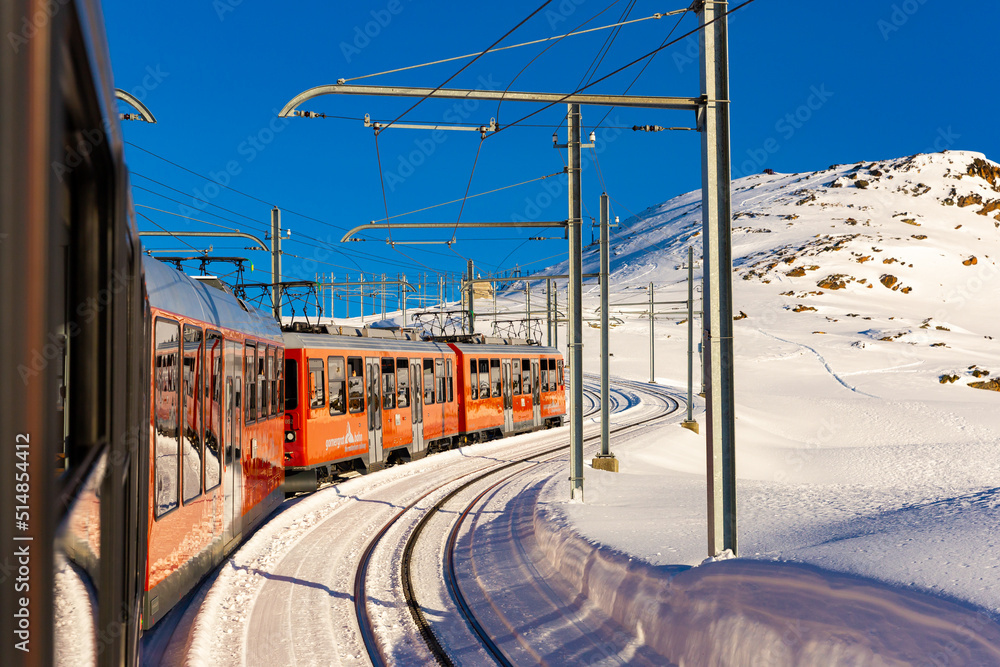 ZERMATT, SWITZERLAND - January 01, 2022: Mountain railway in Swiss Alps ...