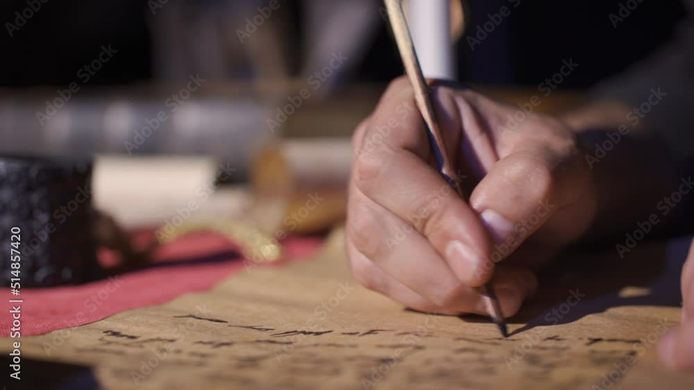 The use of pen and paper in the Middle Ages. Medieval man writing ...