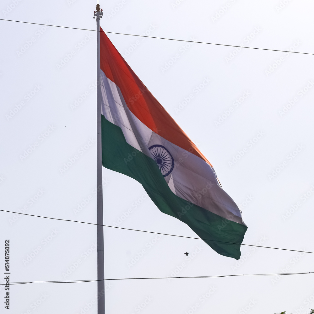 India flag flying high at Connaught Place with pride in blue sky, India ...