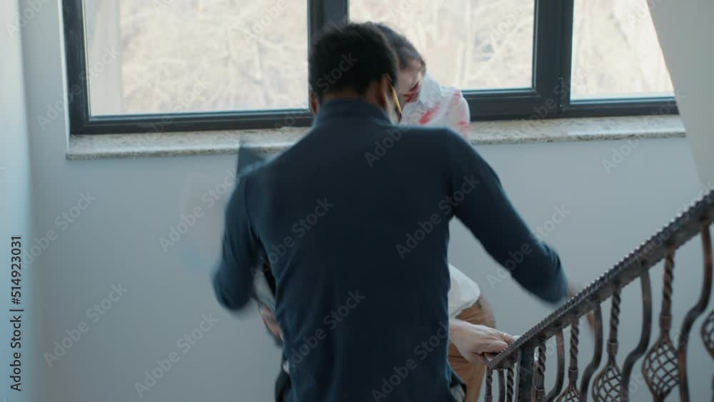 Terrified man on emergency stairway running away from spooky looking ...