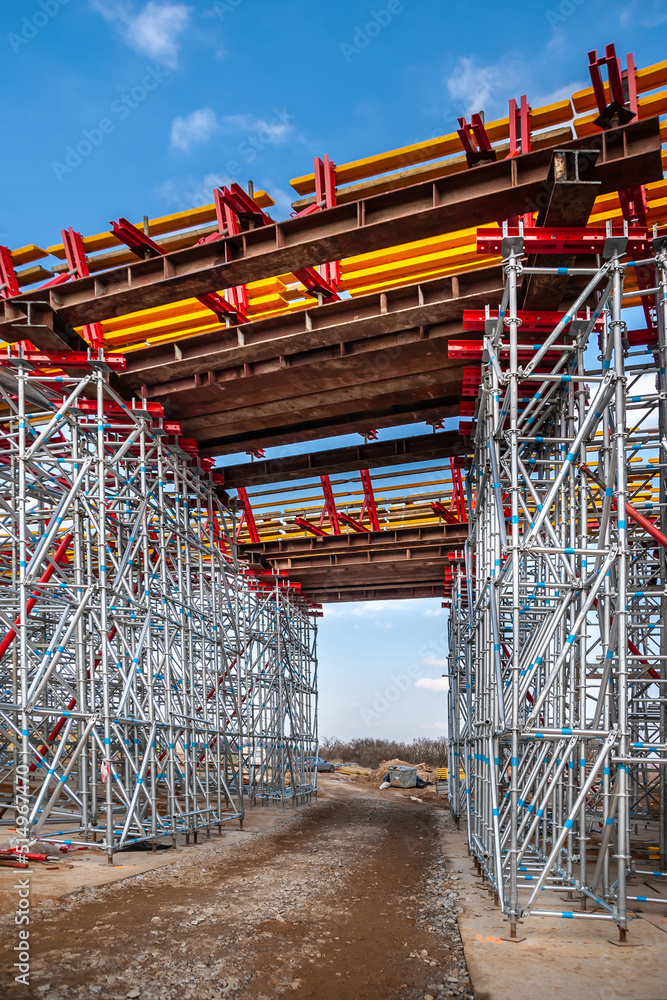 Scaffolding at the construction of a road bridge Stock Photo | Adobe Stock