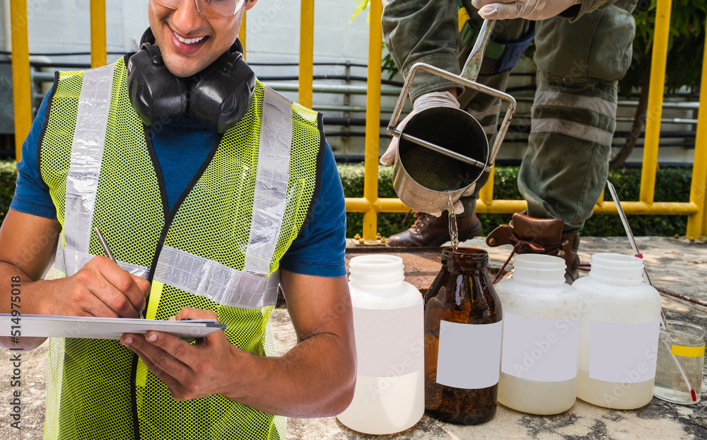 Engineering technician Collecting water From wastewater treatment ...
