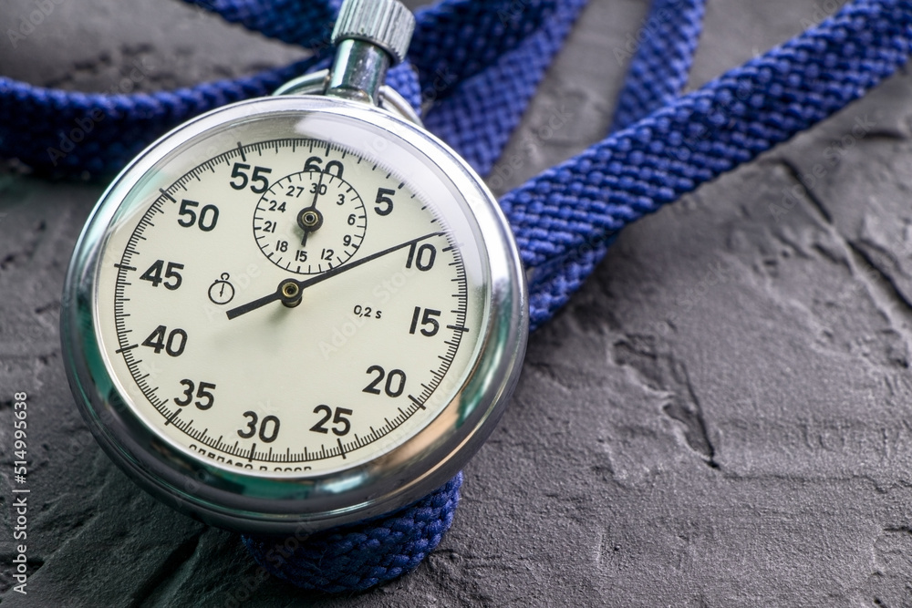 Analog stopwatch close-up. Counting time by stopwatch. Time measurement ...