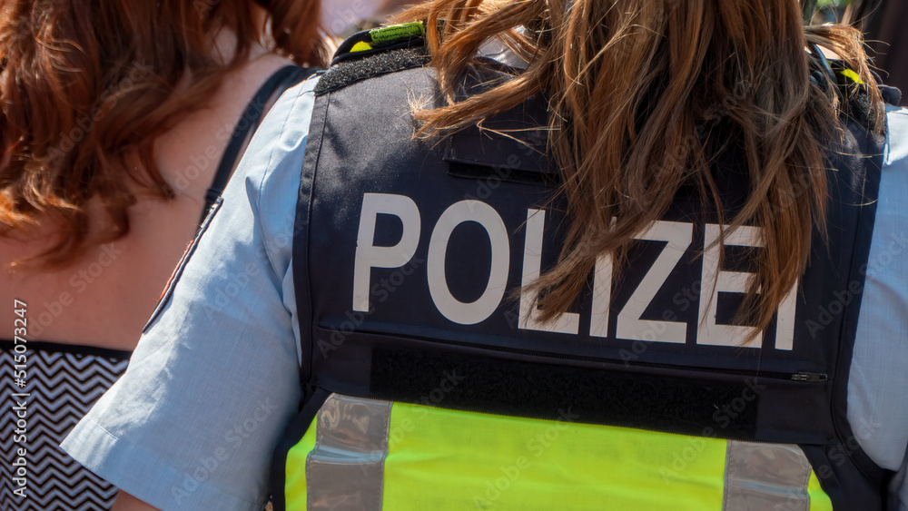 German female police officers on duty on the street Stock Photo | Adobe ...