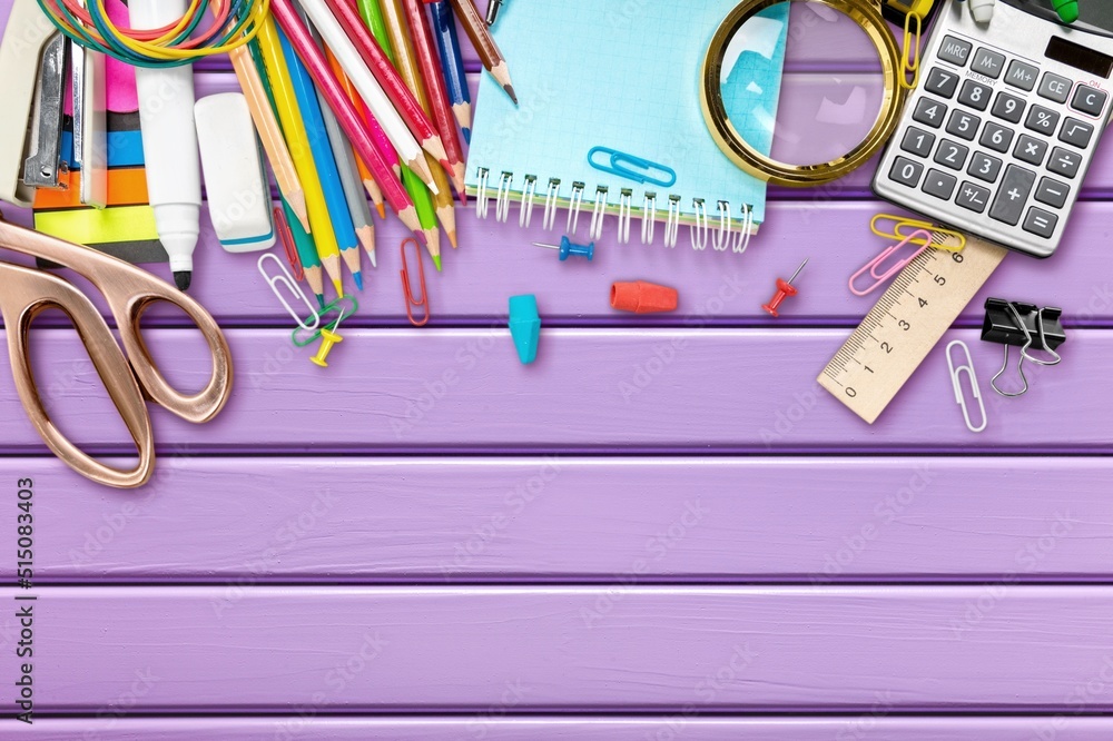 School stationery on background. Colorful math fractions, rulers, open ...