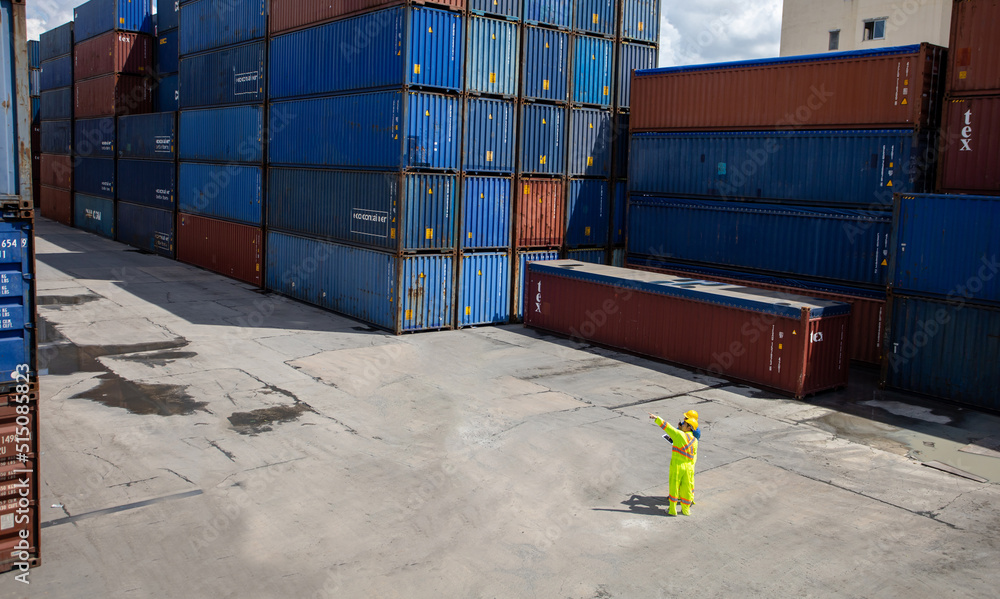 Group workers people in safety uniforms and hard hats work at logistics ...