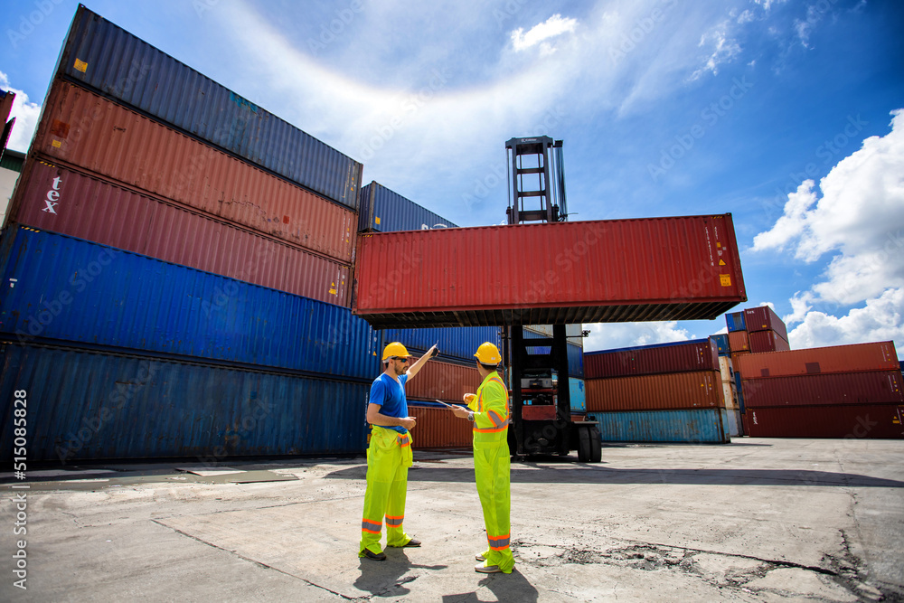 Group workers people in safety uniforms and hard hats work at logistics ...