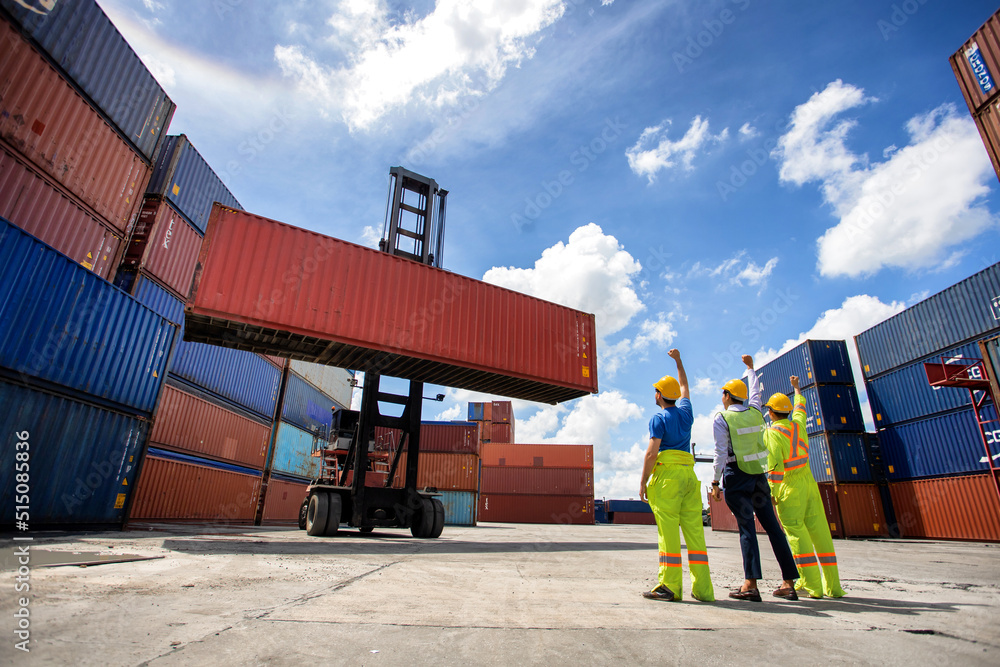 Group workers people in safety uniforms and hard hats work at logistics ...