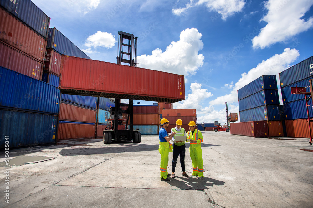 Group workers people in safety uniforms and hard hats work at logistics ...