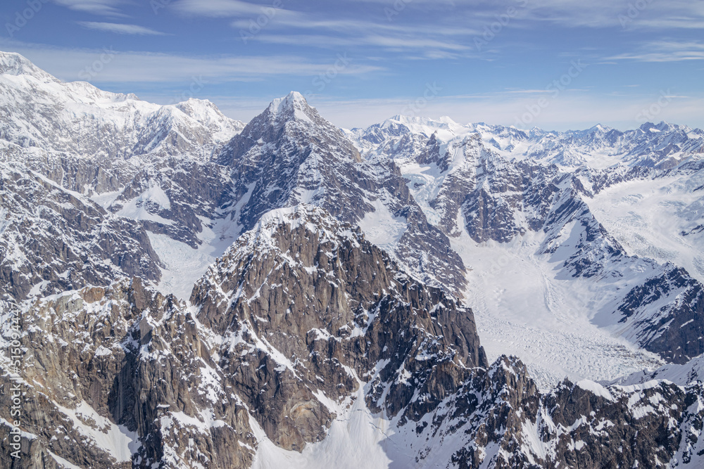 Expansive views of the snow and ice covered mountains in the Alaska ...