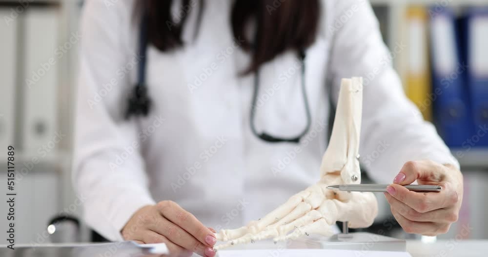 Doctor demonstrates model of human ankle bone anatomy Stock Video ...