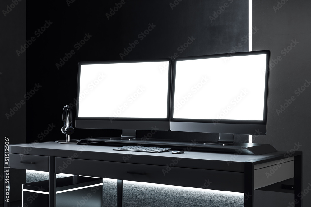 Total black concept with perspective view on two blank white monitor ...