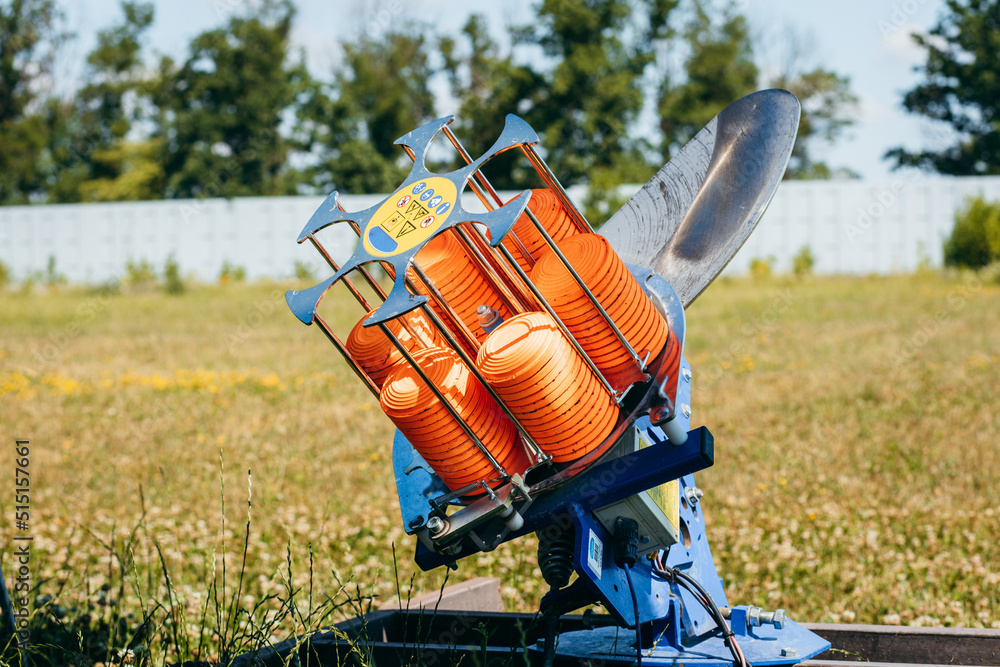 Plat machine with orange shooting plate for shooting-ground training on ...