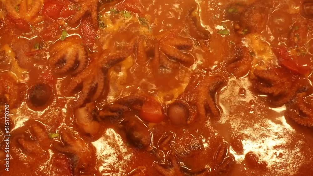 Stewed octopus with tomatoes, typical Italian recipe called stewed ...