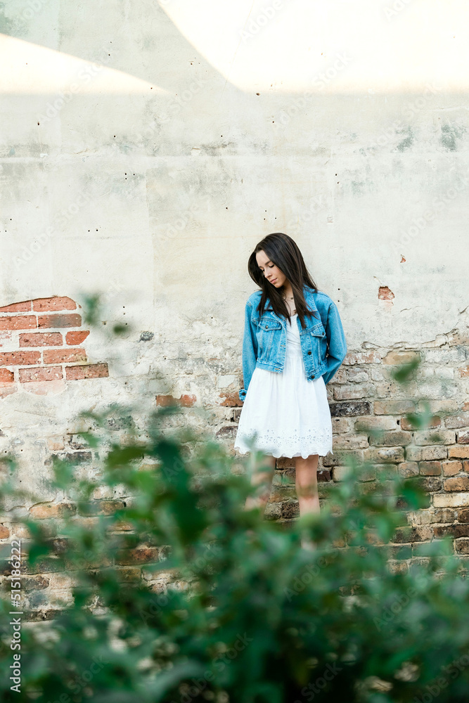 A Teenage Girl With Freckles And Long Dark Stright Hair Outside Leaning 1108