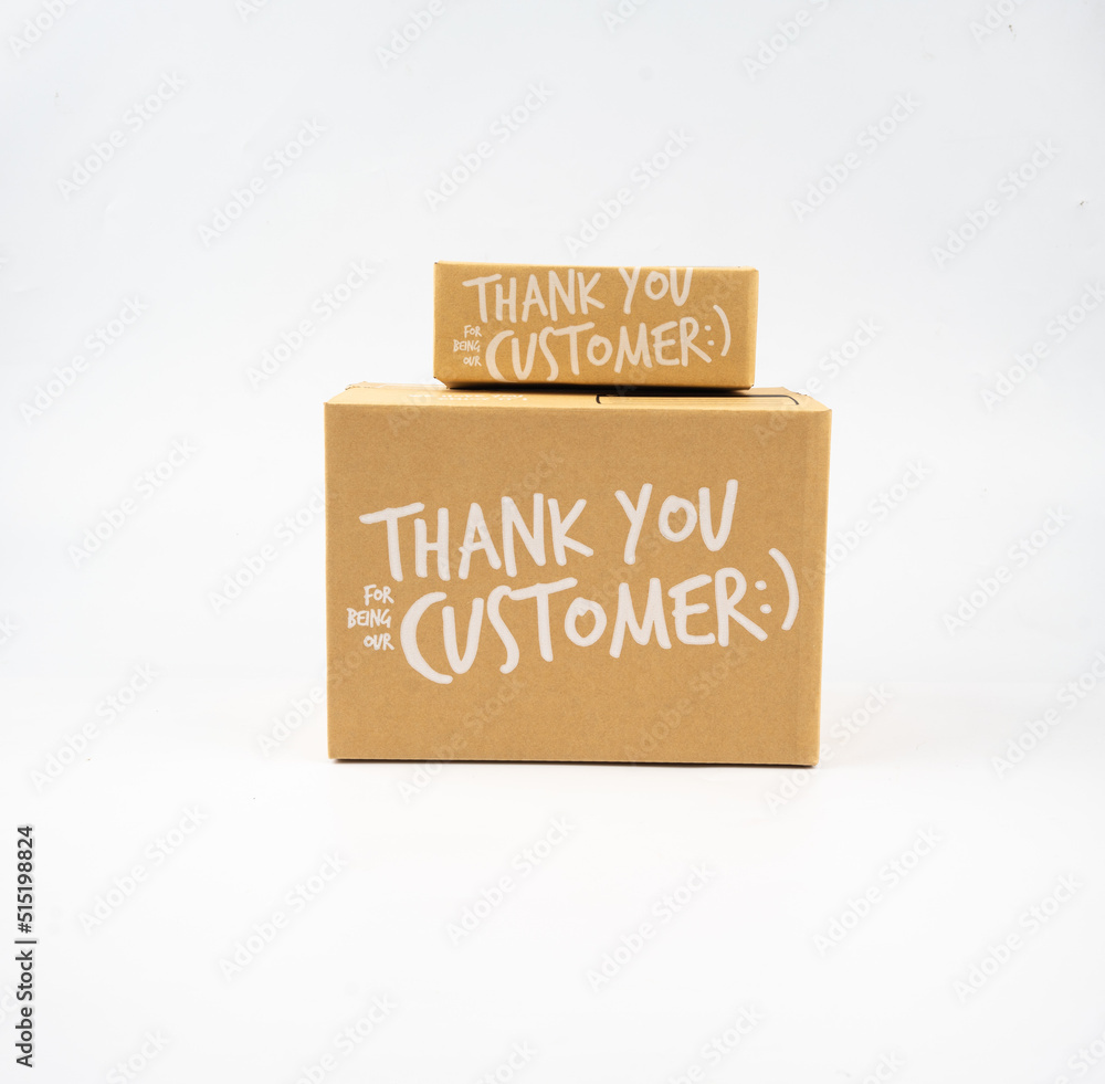Two closed cardboard boxes taped up, and there is a Thank you for being ...