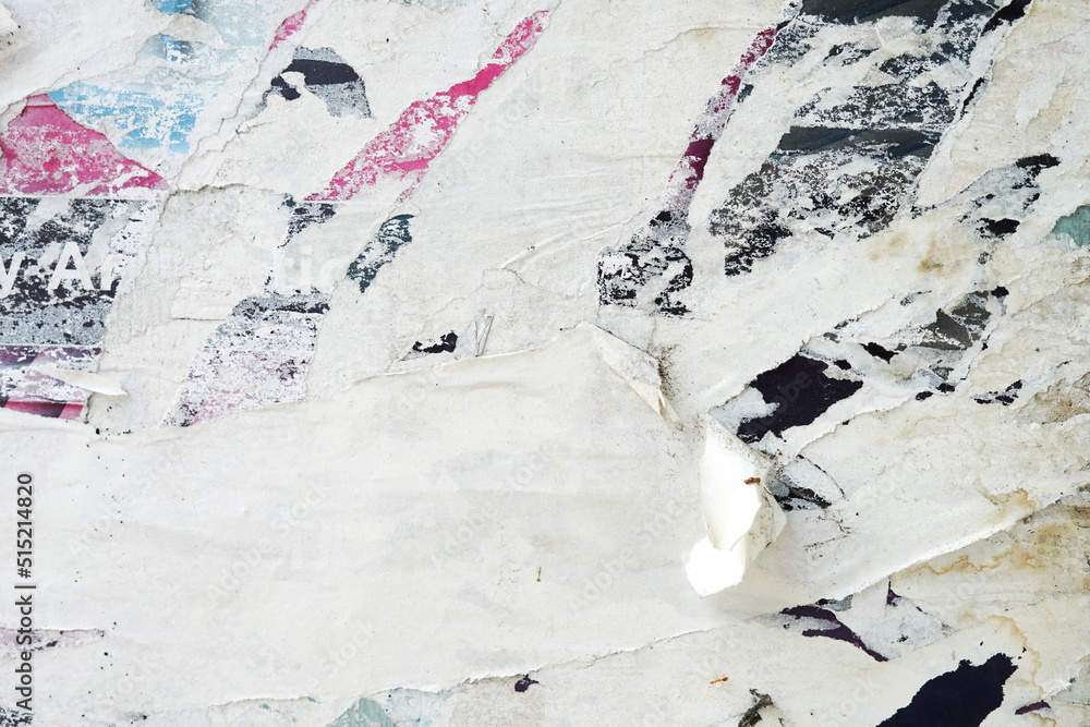 abstract torn paper poster on the wall for background texture. the ...
