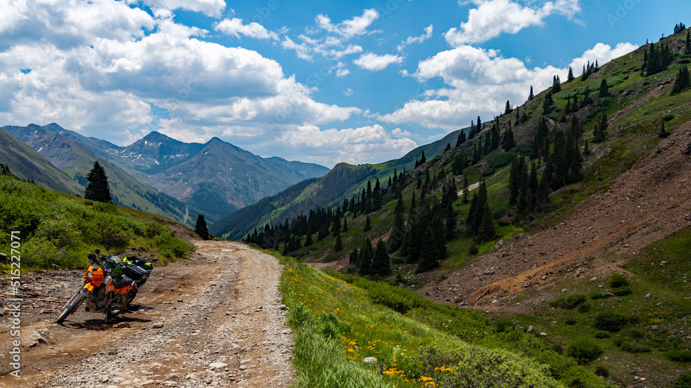 Motorcycle ready to ride on Animas Mountain Loop Trail ; an iconic off ...