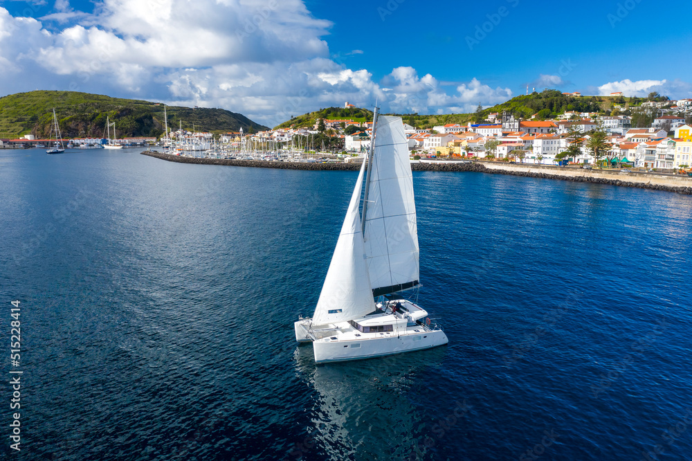 Aerial View of Sailboat while sailing in a regatta off the coast on ...