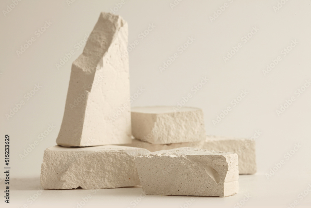 Empty stack of stones platform podium on beige background. Minimal ...