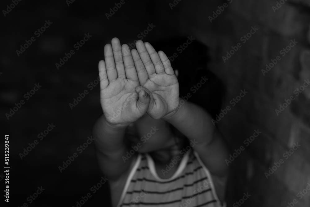 Little child girl stoping child abuse and domestic violence from both ...