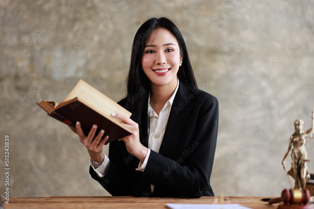 Business woman Lawyer office. Statue of Justice with scales and a ...