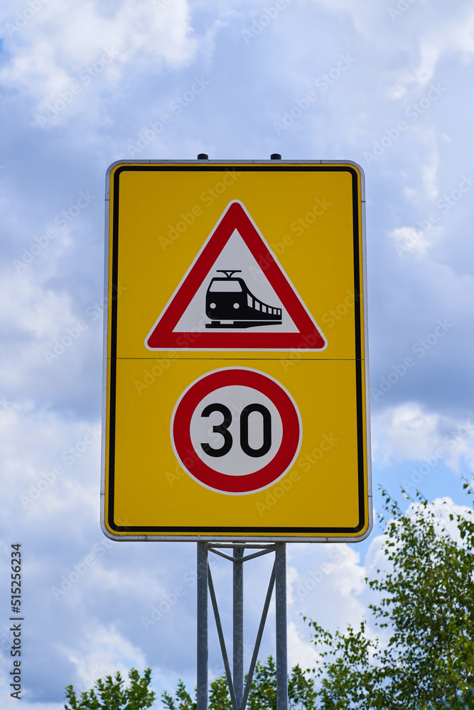 The traffic sign means unrestricted train crossing. The speed limit is ...
