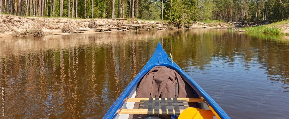 Canoe riding on Irbe river. Kurzeme, Latvia. Sandy shore, evergreen ...