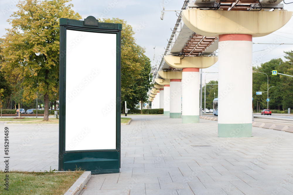 Vertical billboard next to monorail pylons in the city. Stock Photo ...