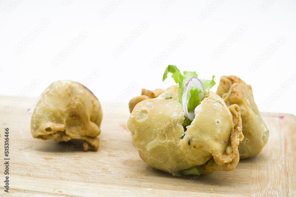deep fried Singara made by potato and maida isolate on white background ...