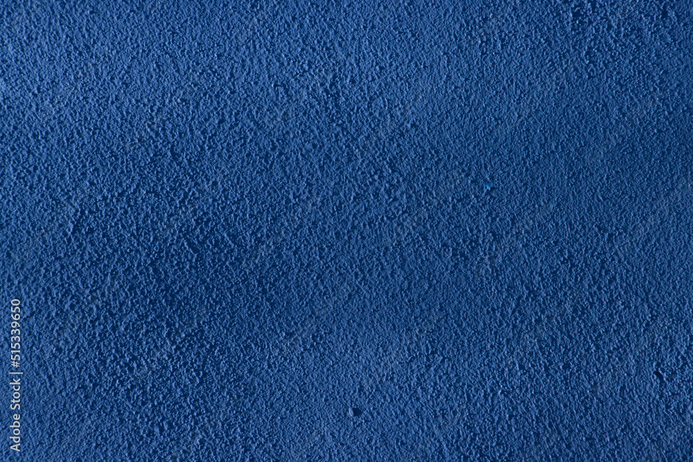Blue colored abstract wall background with textures of different shades ...