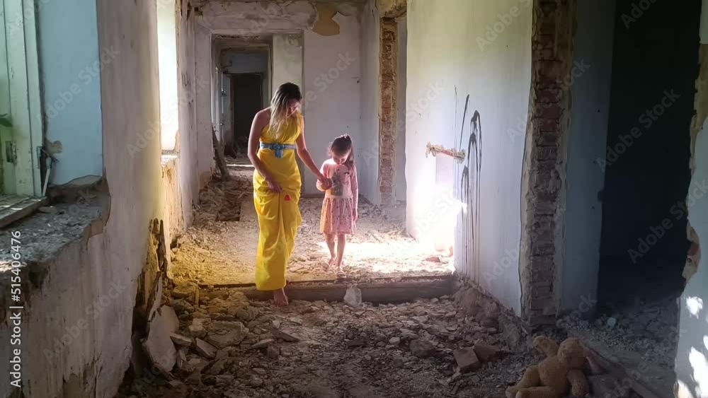 A mother and child are hiding in the basement. War in Ukraine. Child ...