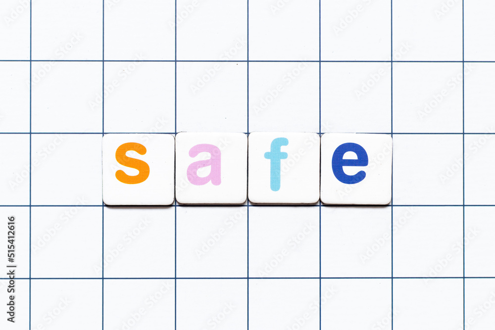 Colorful tile letter in word safe on white grid background Stock Photo ...