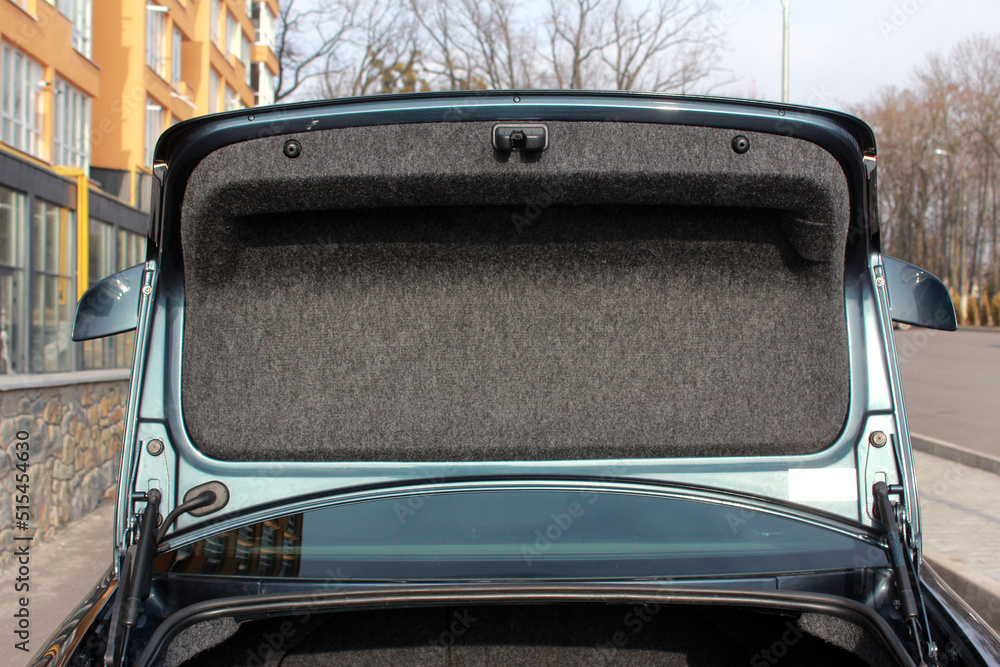 Modern car trunk lid. Trunk lid interior. Trunk lid lining. Open trunk ...