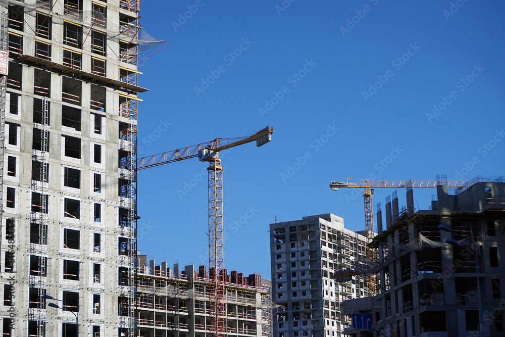 Construction of a modern residential building. An unfinished house and ...