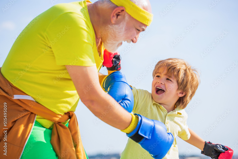 Little boy sportsman at boxing training with coach. Sports man coaching ...