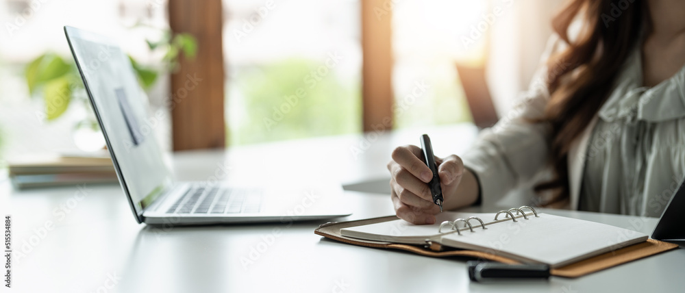Close up of concentrated female student busy studying using laptop make ... Close up of concentrated female student busy studying using laptop make ...