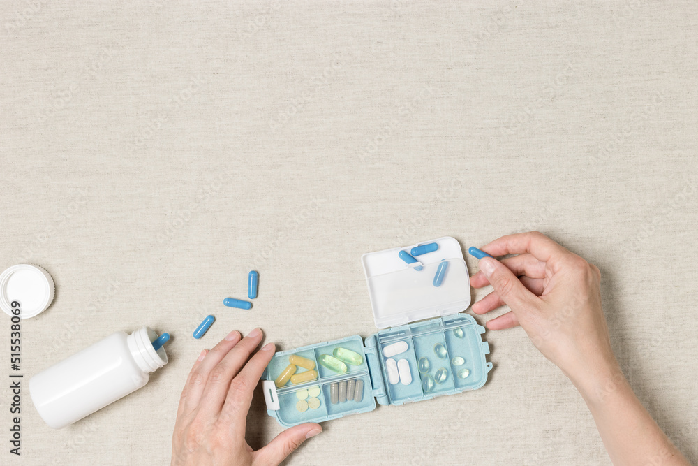 Blue pill box for daily taking medicine, tablets and capsules. Medicine ...