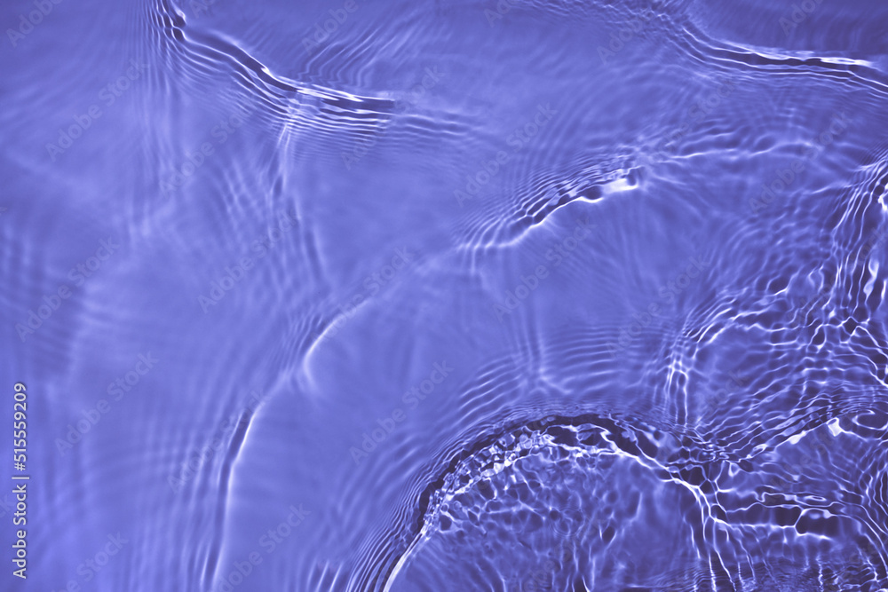 Transparent purple water surface texture with ripples, splashes and ...