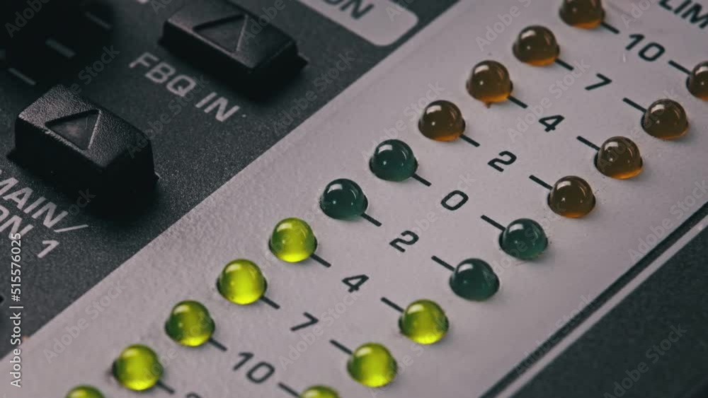 LED indicator of sound level signal on the mixing console. LED strip in ...