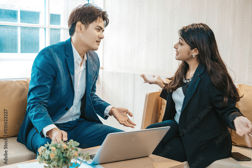 Angry asian businesswoman arguing with businessman about work failure ...