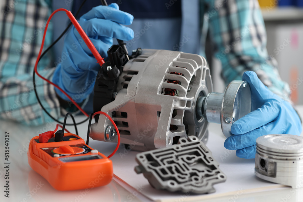 Automotive alternator repair test stator closeup with copper coil in ...
