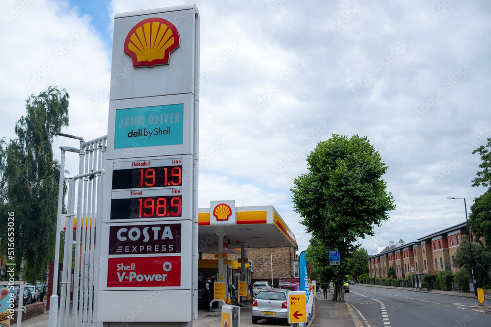London- June 2022: Shell service petrol station sign and prices Stock ...