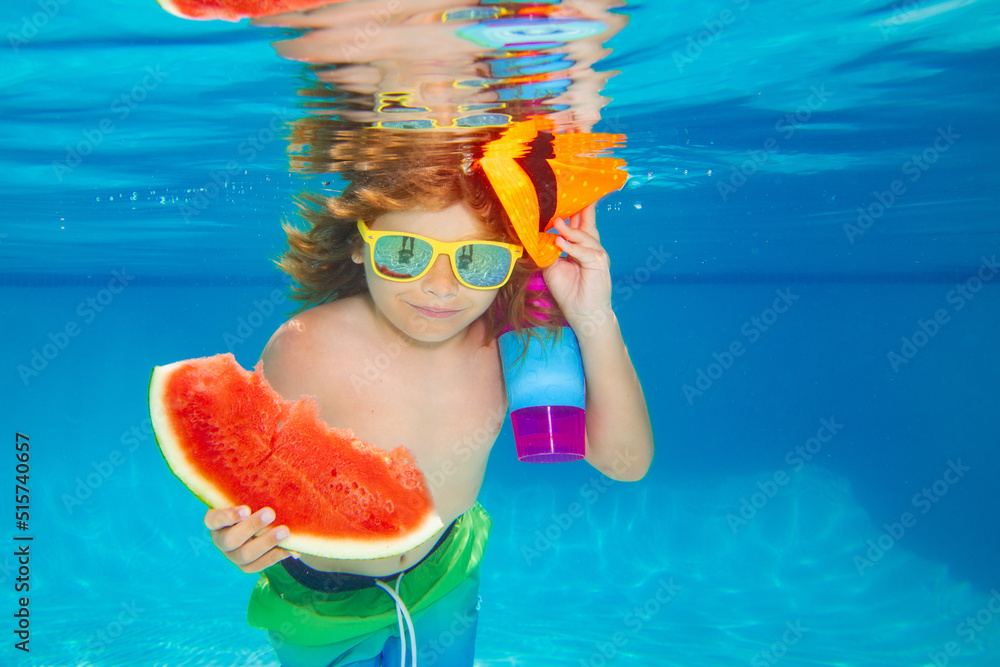 Summer kids portrait in pool water. Child swim and dive underwater in ...