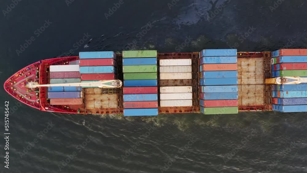 Large container ship at sea - top down view. Top view from a drone on a ...